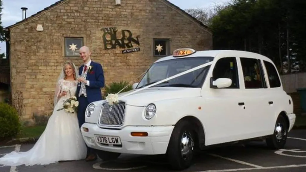 White Modern Taxi Cab for hire in Nottinghamshire