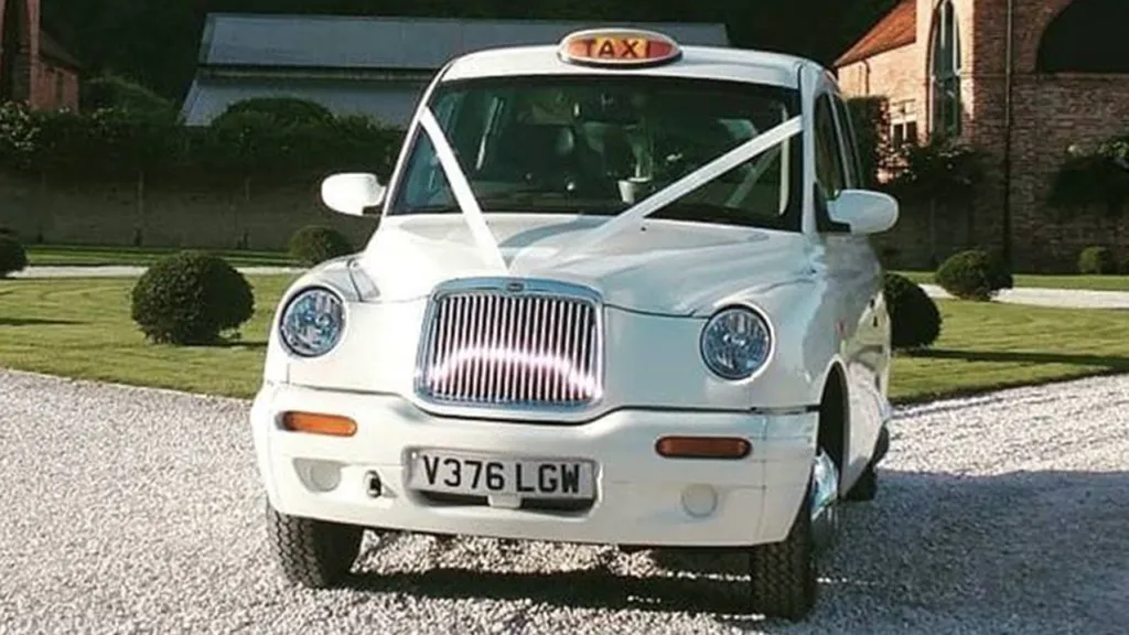 White Modern Taxi Cab for hire in Nottinghamshire