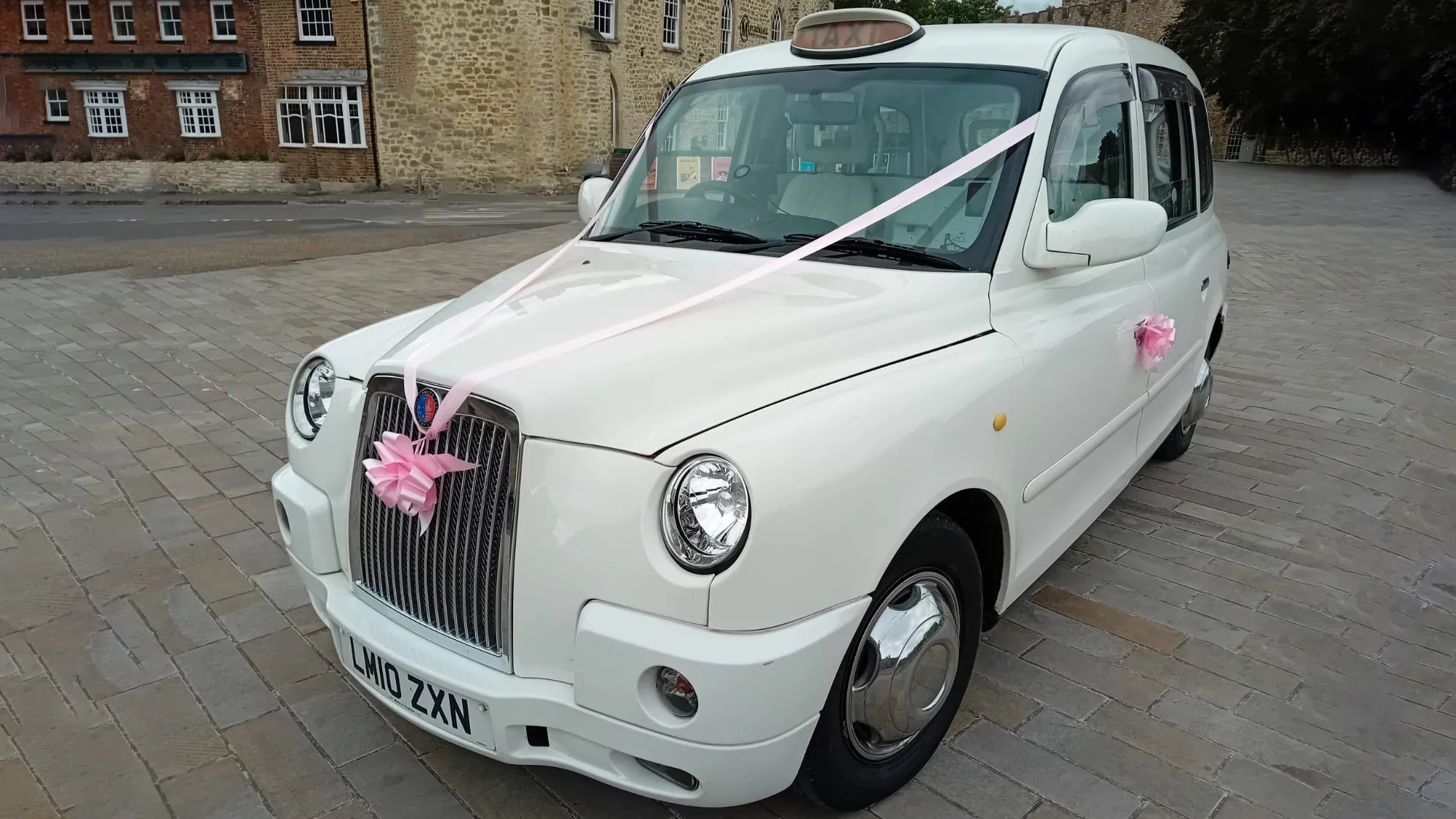 Modern White Wedding taxi Cab for Hire in Devon & Cornwall