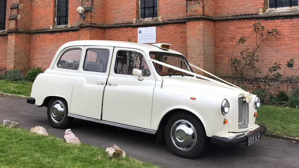 Classic Ivory Taxi Cab available to hire for Weddings in London and Surrey