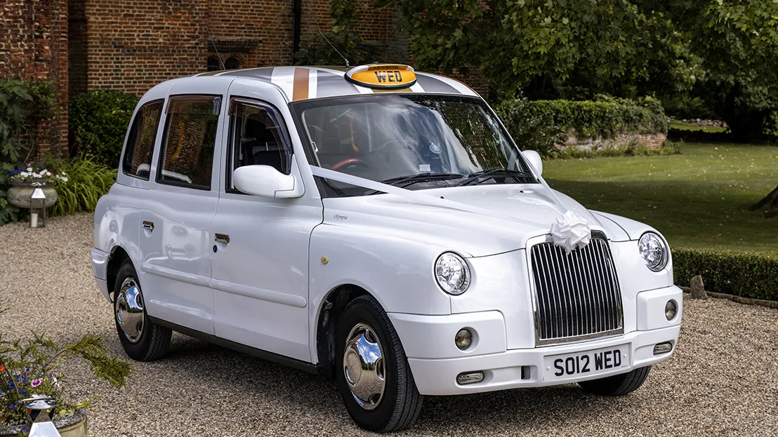 White 6-seater Taxi Cab available for hire in Essex