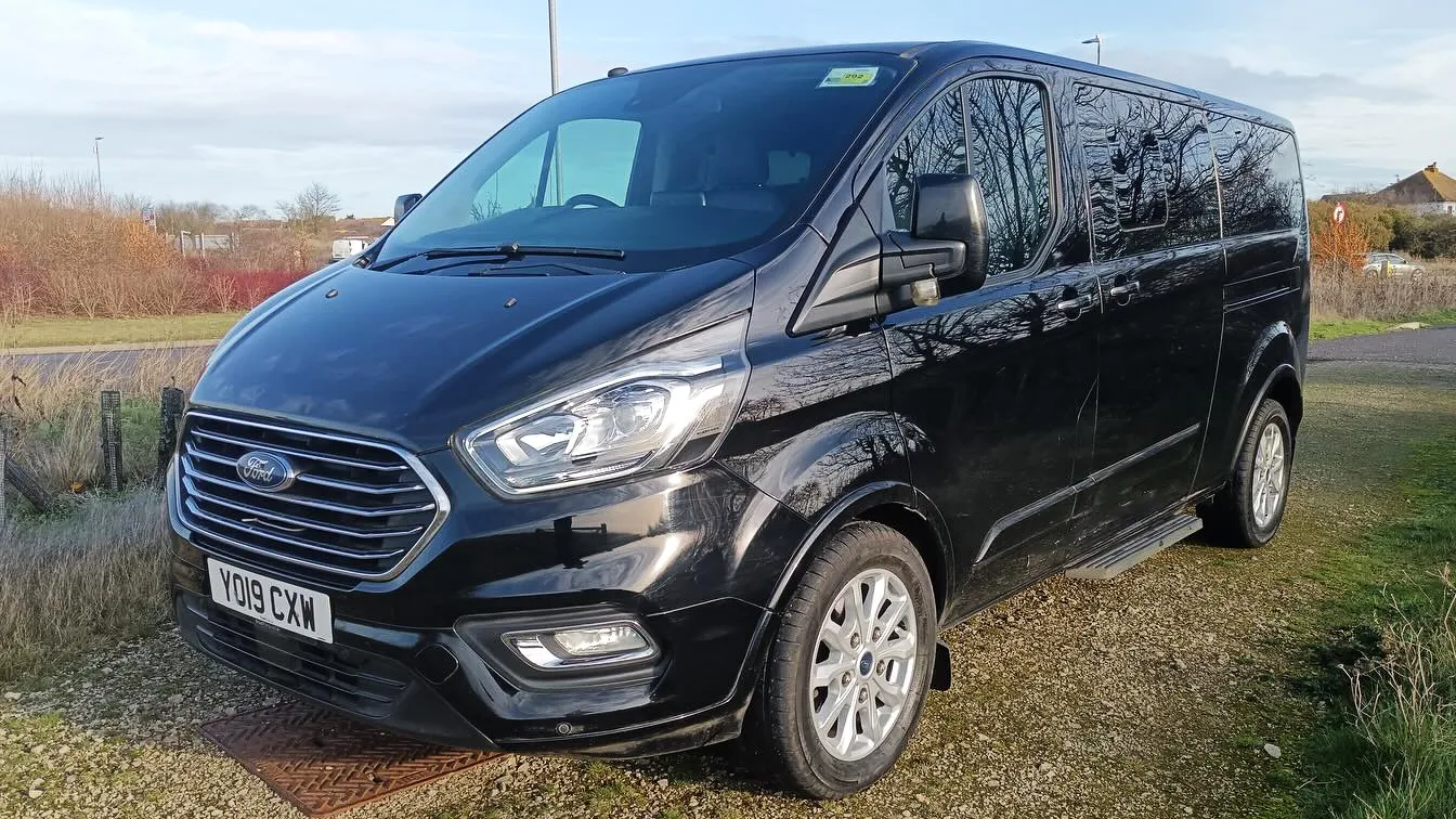 Black 8-seater Ford Mini Bus for Wedding Hire in East Anglia