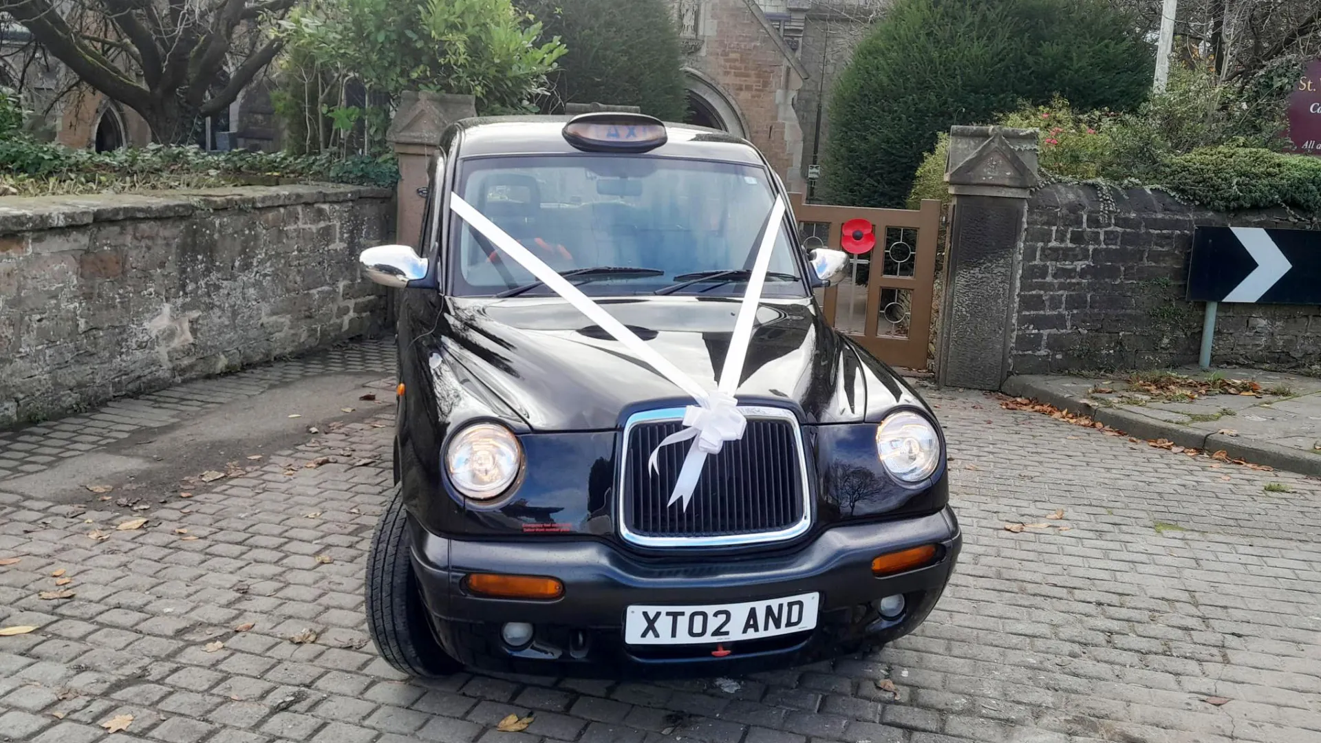 White Electric Taxi Cab for Wedding hire in London and Home counties