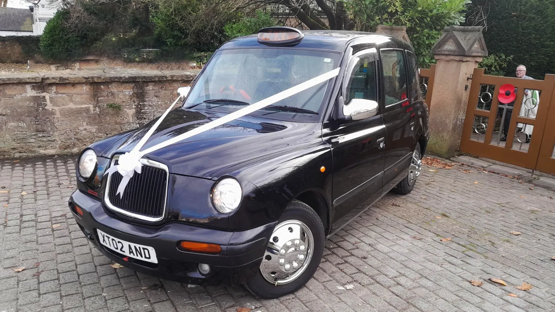 White Electric Taxi Cab for Wedding hire in London and Home counties