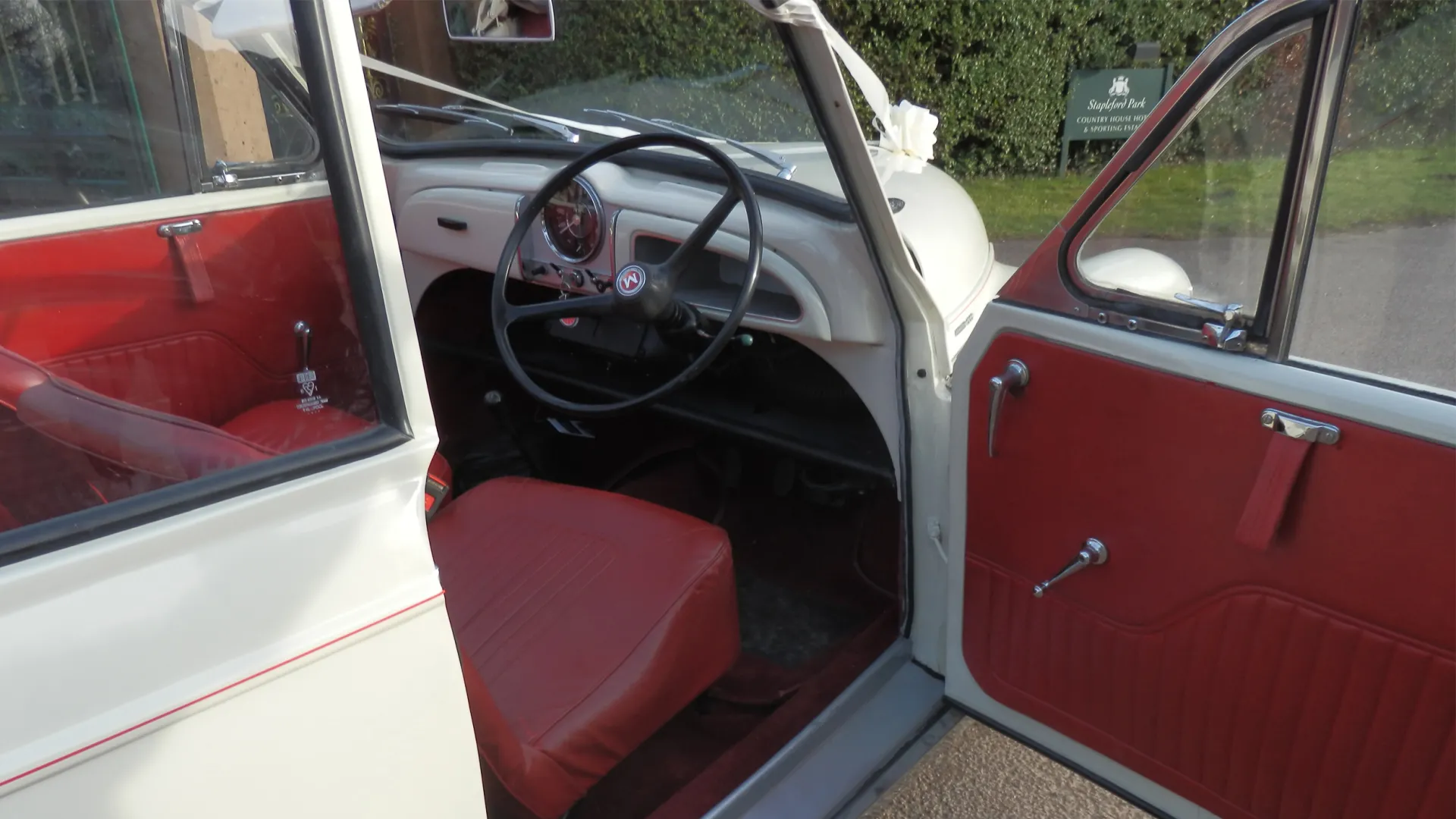 Convertible White Morris Minor for Weddings in Leicester