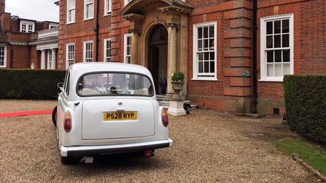 White Classic London Taxi Cab for Hire | Premier Carriage