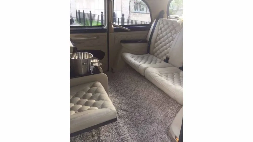 White Electric Taxi Cab for Wedding hire in London and Home counties