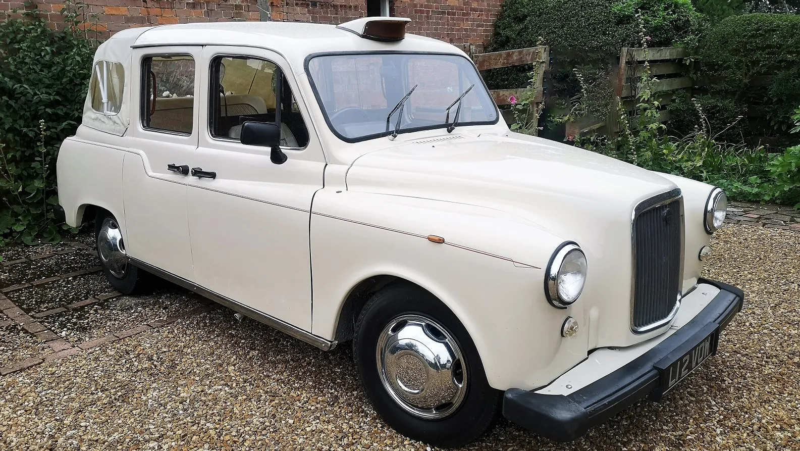 Classic Ivory Taxi Cab Convertible Wedding Car Hire Bedford & London