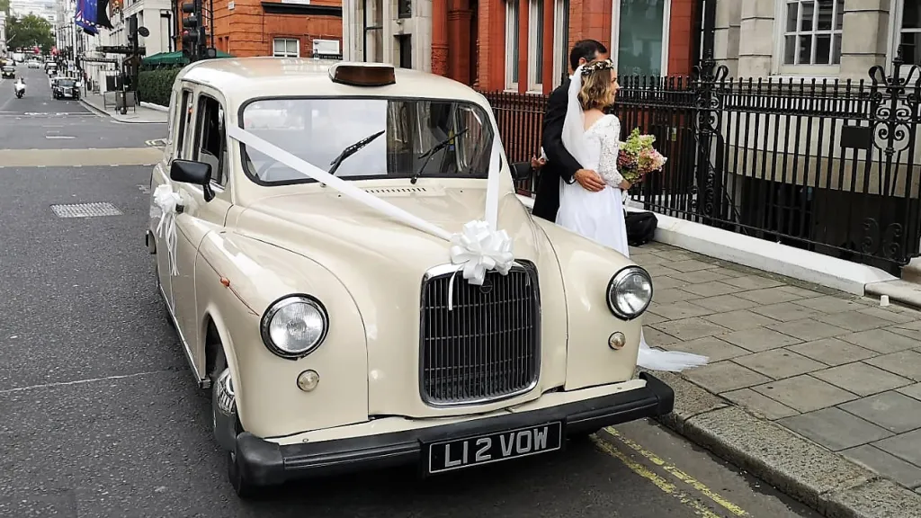 Classic Ivory Taxi Cab Convertible Wedding Car Hire Bedford & London