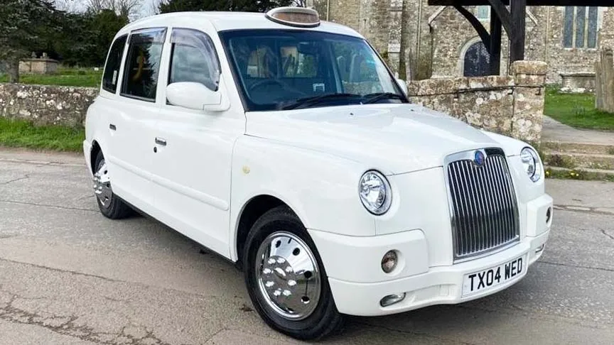 White Modern Taxi Cab for wedding hire in Midlands