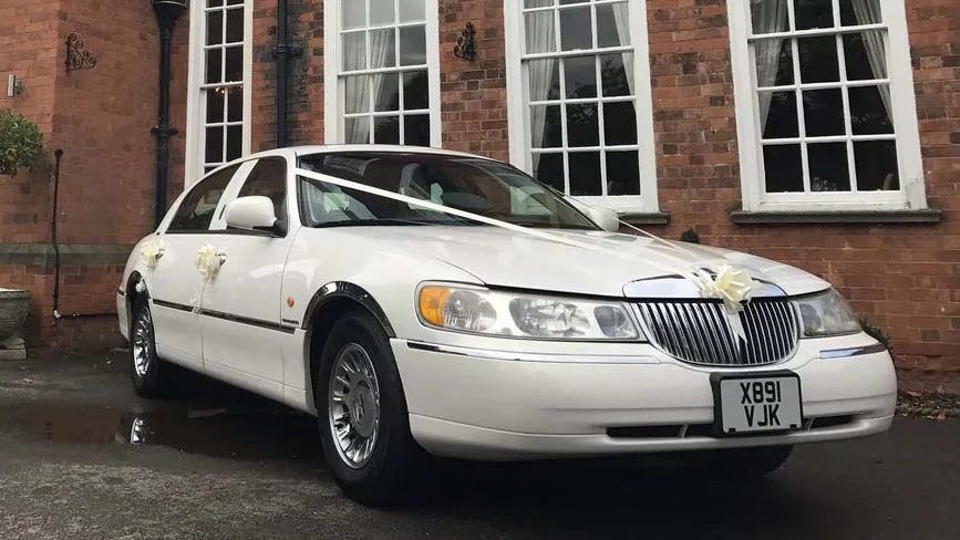 White Lincoln Town Car (Cartier Edition) | Premier Carriage