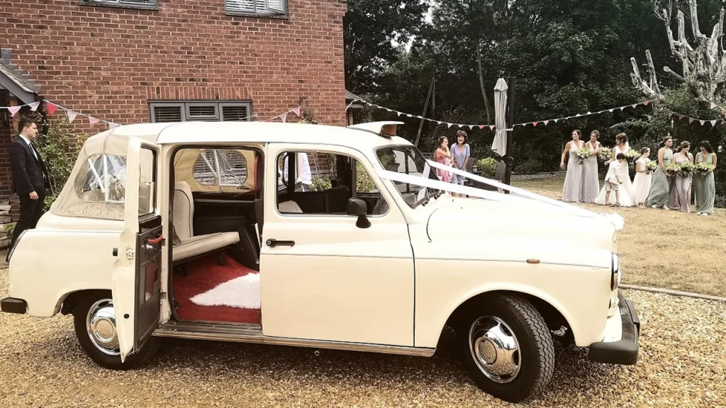 White Electric Taxi Cab for Wedding hire in London and Home counties