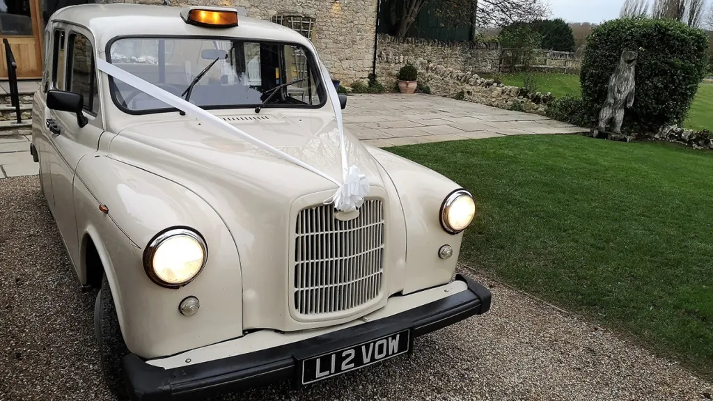 Classic Ivory Taxi Cab Convertible Wedding Car Hire Bedford & London